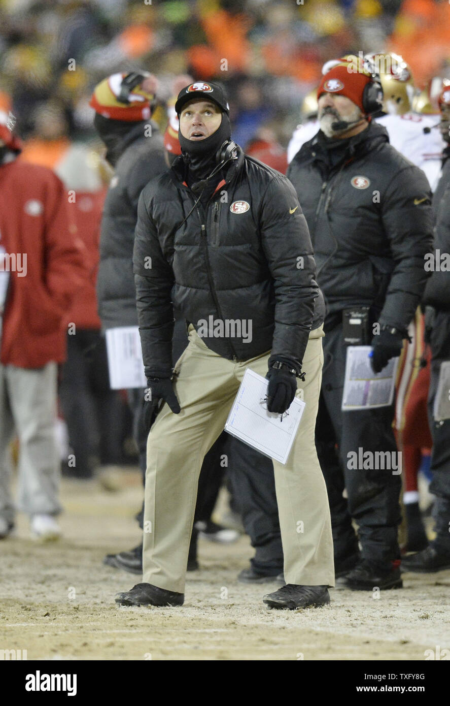 San Francisco 49ers head coach Jim Harbaugh stands on the sidelines ...