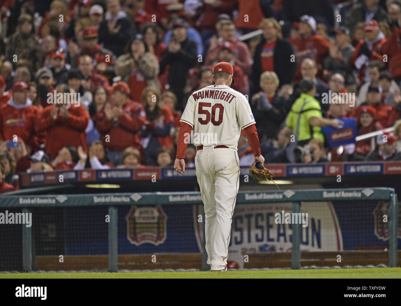 St. Louis Cardinals pitcher Adam Wainwright walks off the field after ...