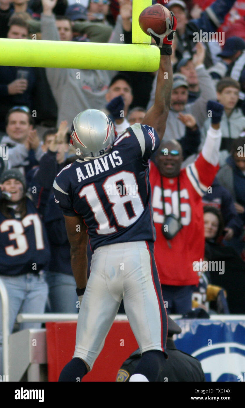 New England Patriots' wide receiver Andre Davis throws the ball over ...