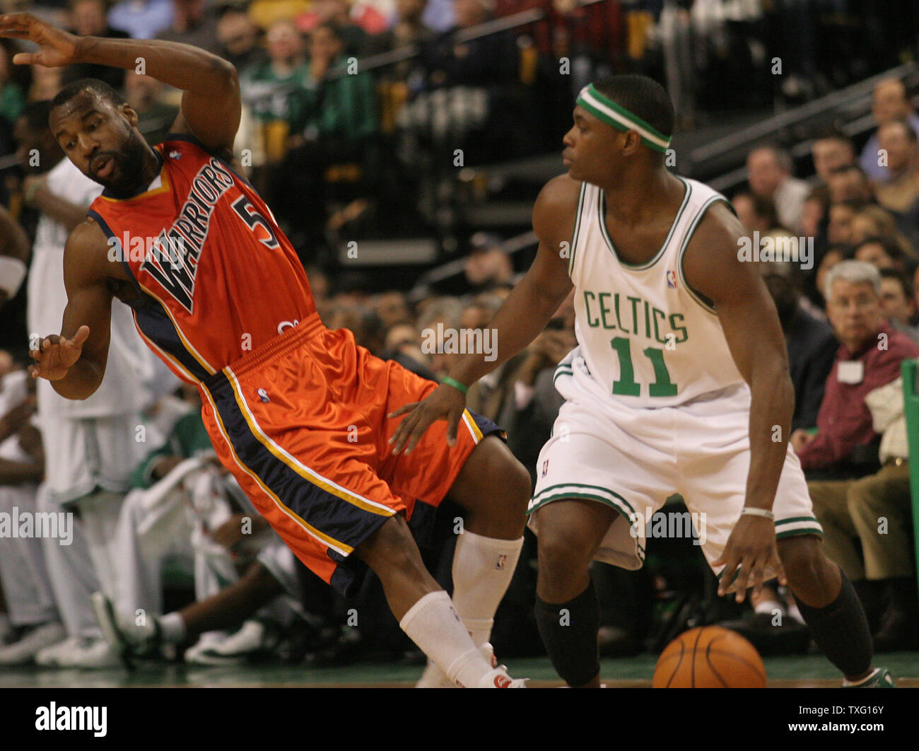 Golden State Warriors guard Baron Davis gets fouled by Boston Celtics ...