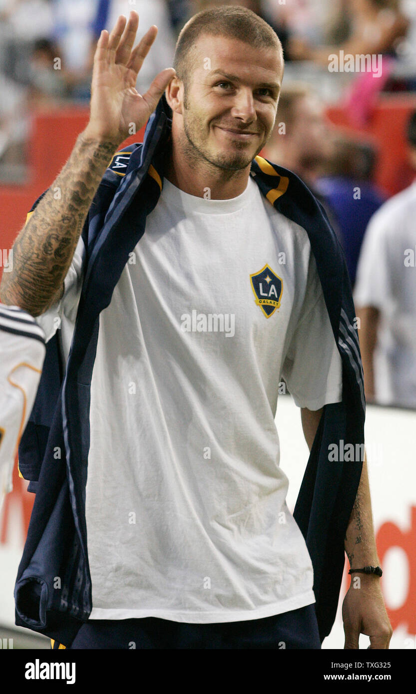 Los Angeles Galaxy midfielder David Beckham waves to the crowd on his ...