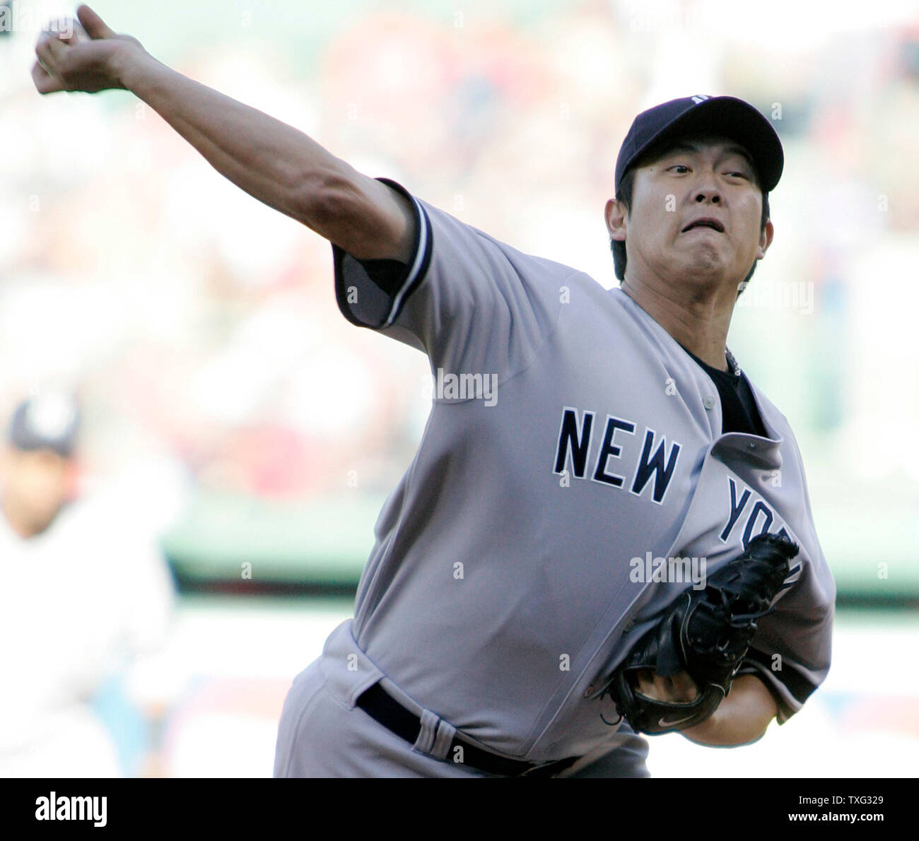New York Yankees starting pitcher Chien-Ming Wang throws a pitch in the ...