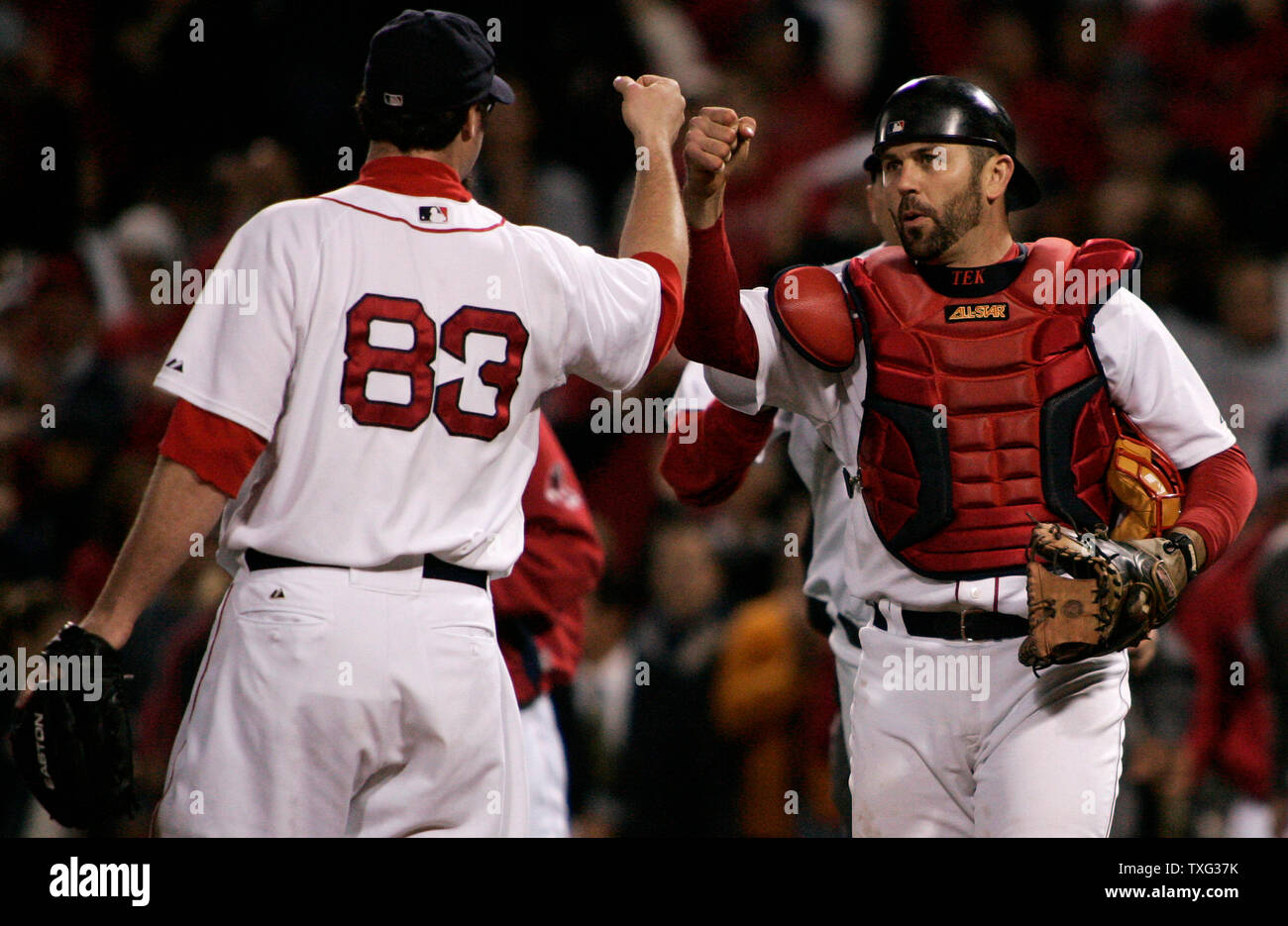 Boston Red Sox closing pitcher Eric Gagne (83) bumps fists with catcher ...