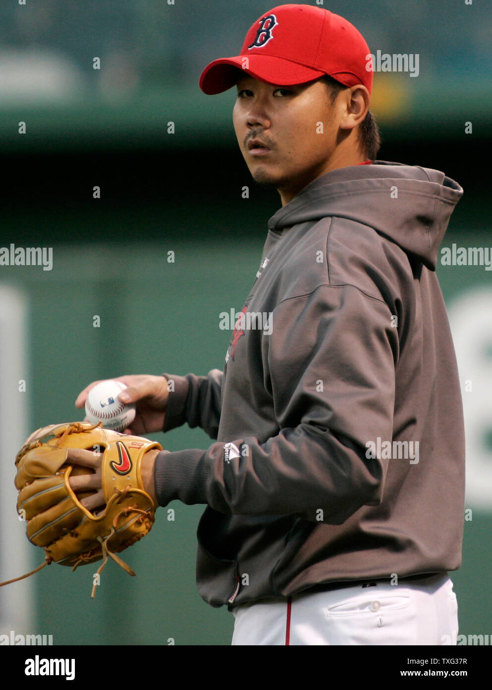 Boston Red Sox pitcher Daisuke Matsuzaka warms up before the start of ...