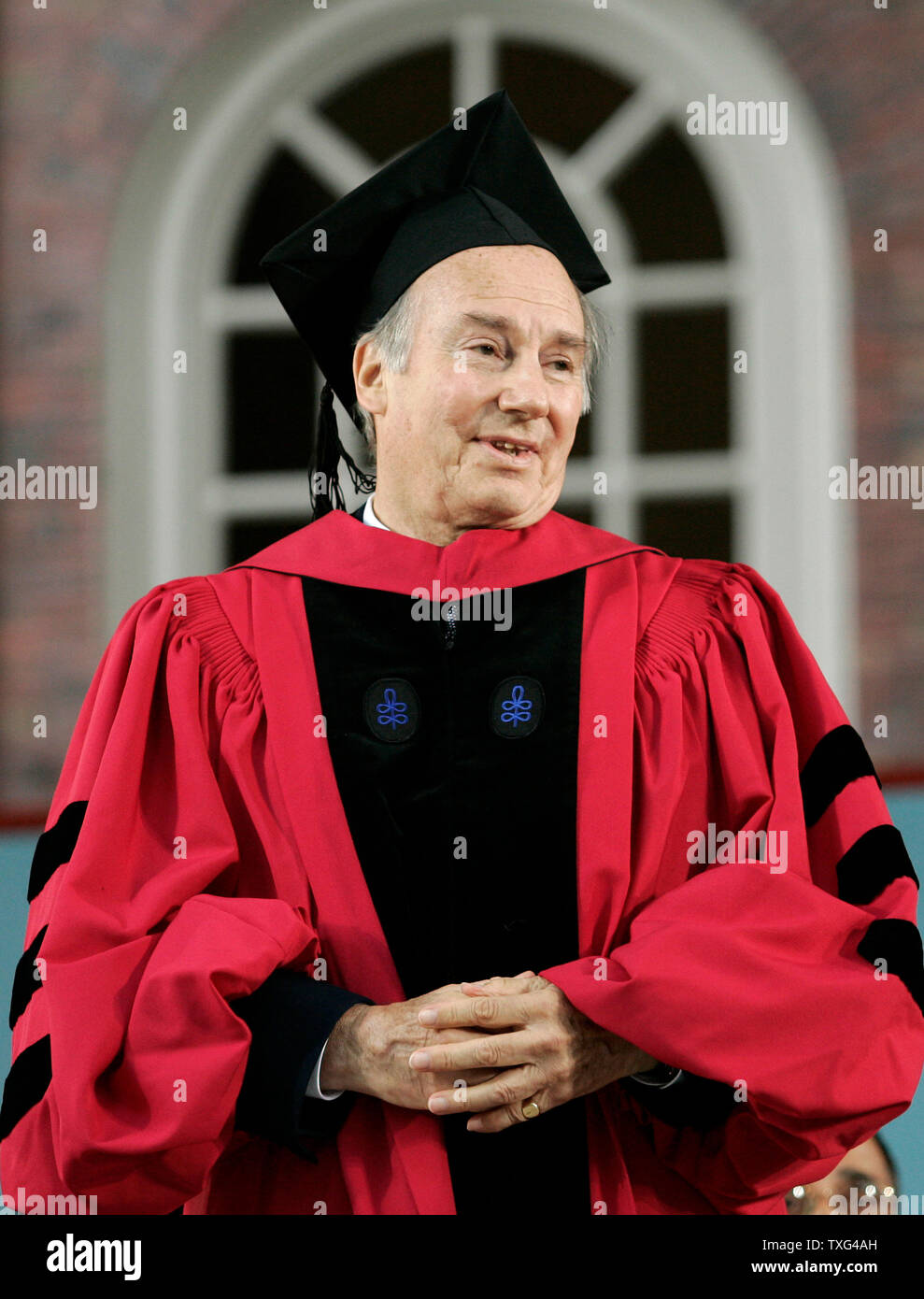 Imam of the Shia Imami Ismaili Muslims, Aga Khan IV sits on stage ...