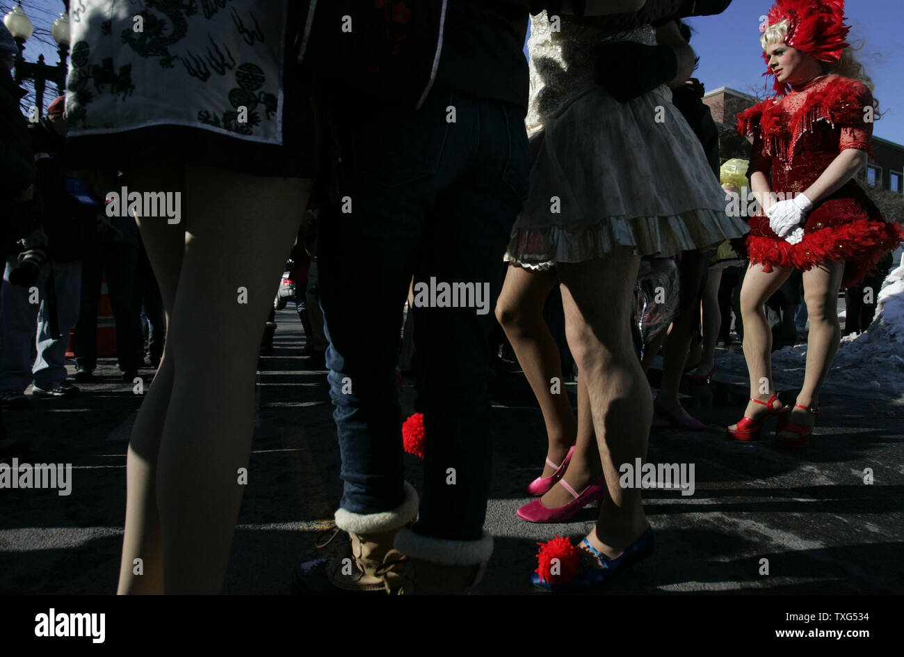 Harvard University freshman Ryan Halprin (R) stands off to the side as some of his colleagues ...
