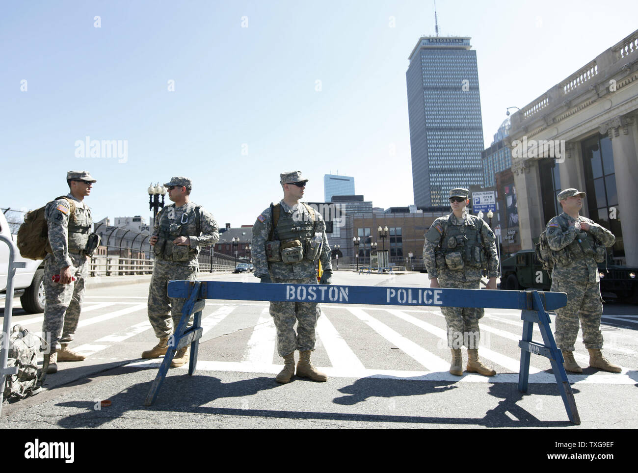 Members of the Army National Guard stand at a checkpoint on Boylston ...