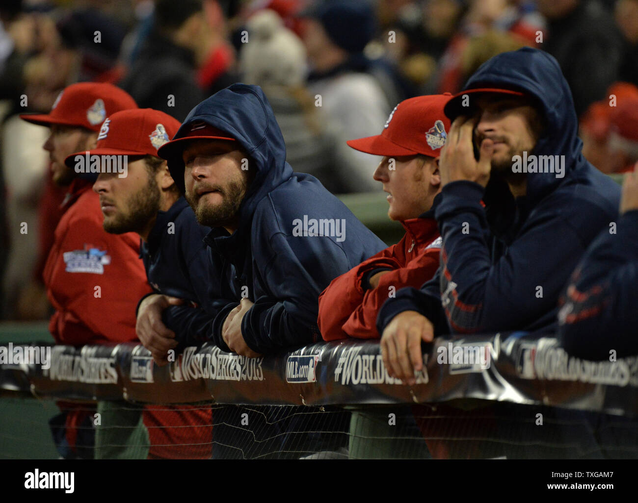 The St. Louis Cardinals dugout watches Boston Red Sox reliever Brandon ...