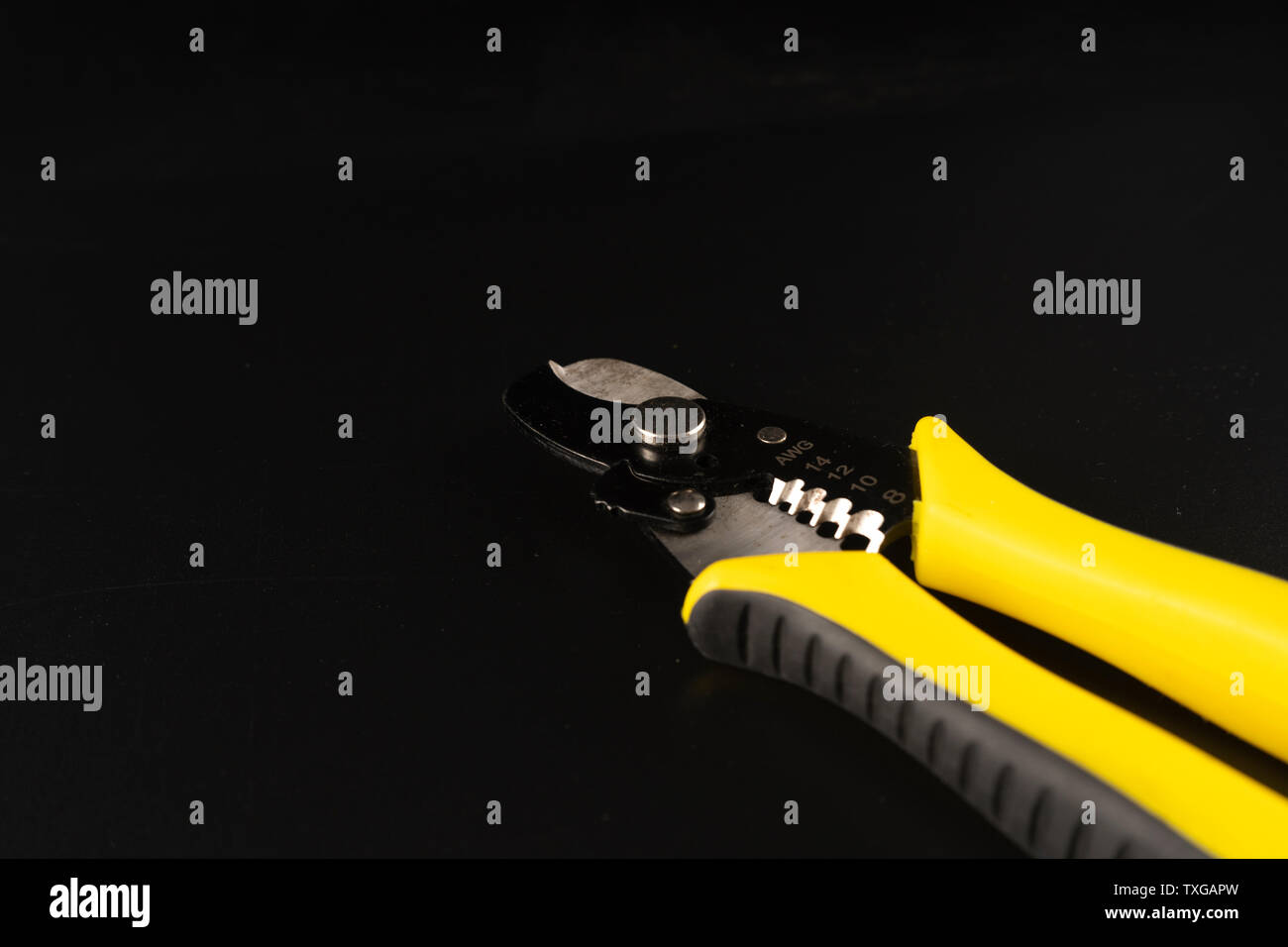 Hardware electrical tool wire-cutting clamp Stock Photo - Alamy