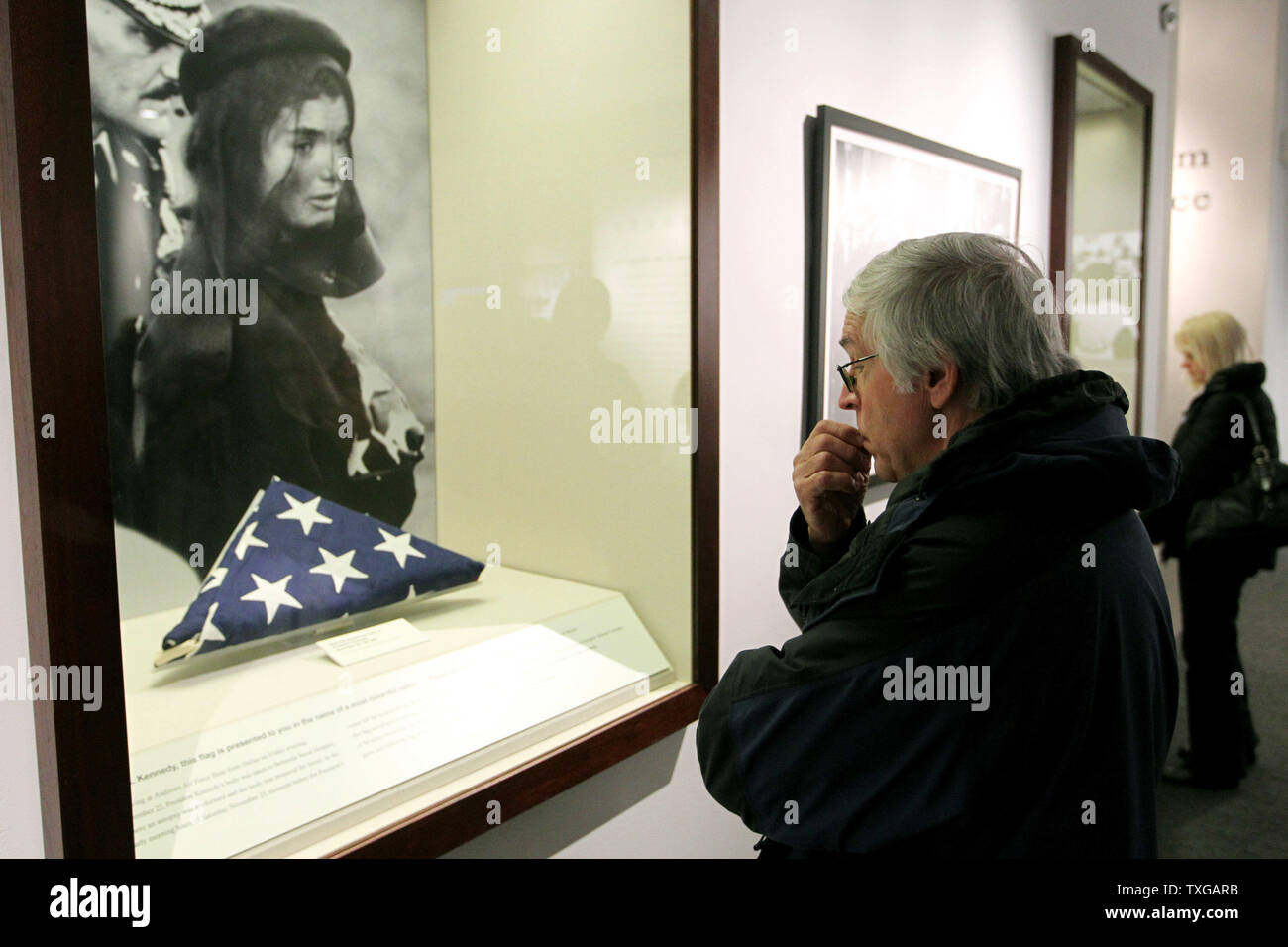 Joe Rose of Weymouth, Massachusetts studies the American Flag that was ...
