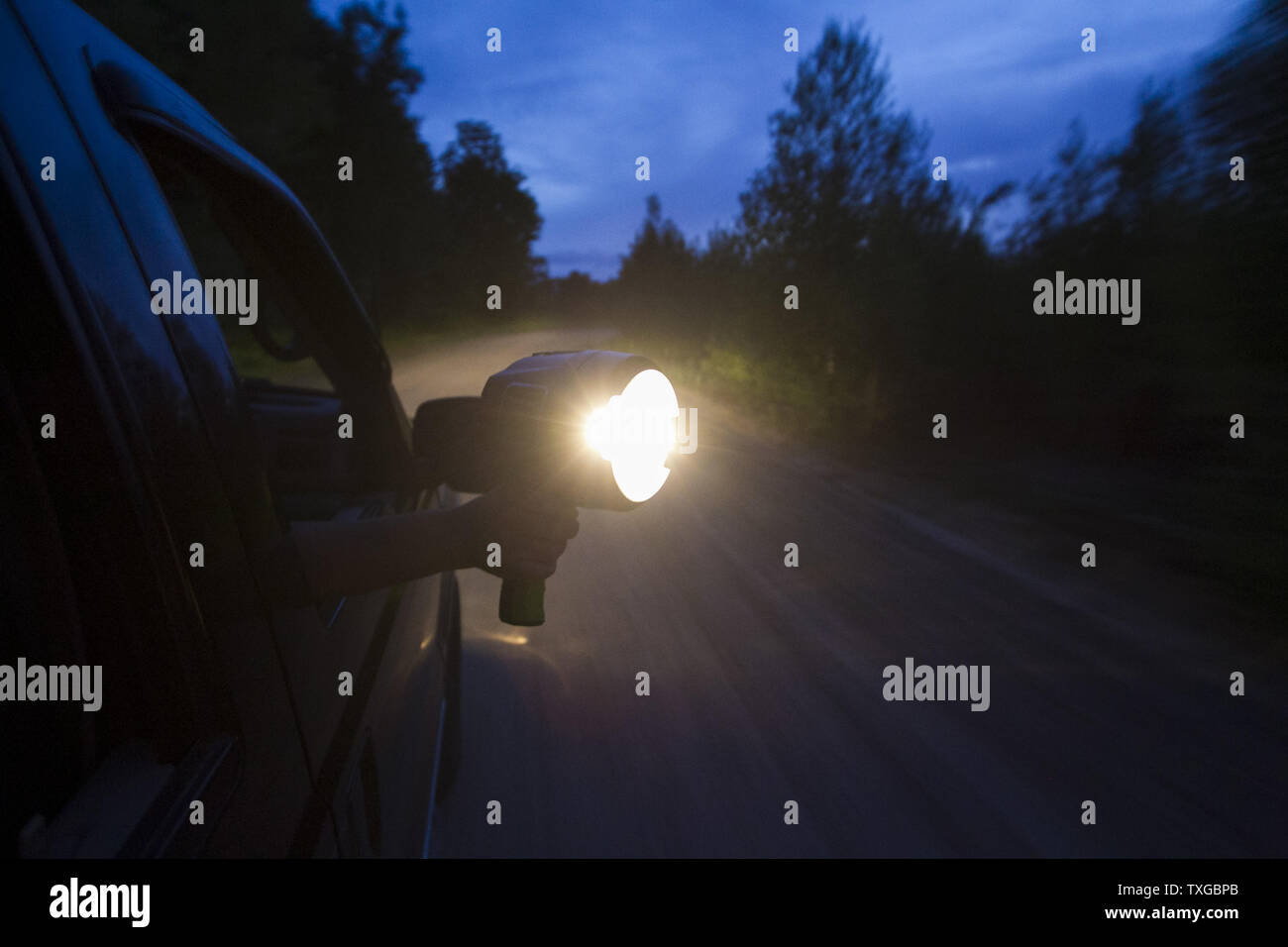 Tom Chubb of the Akawesasne Mohawk Territory trains a spotlight on the ...