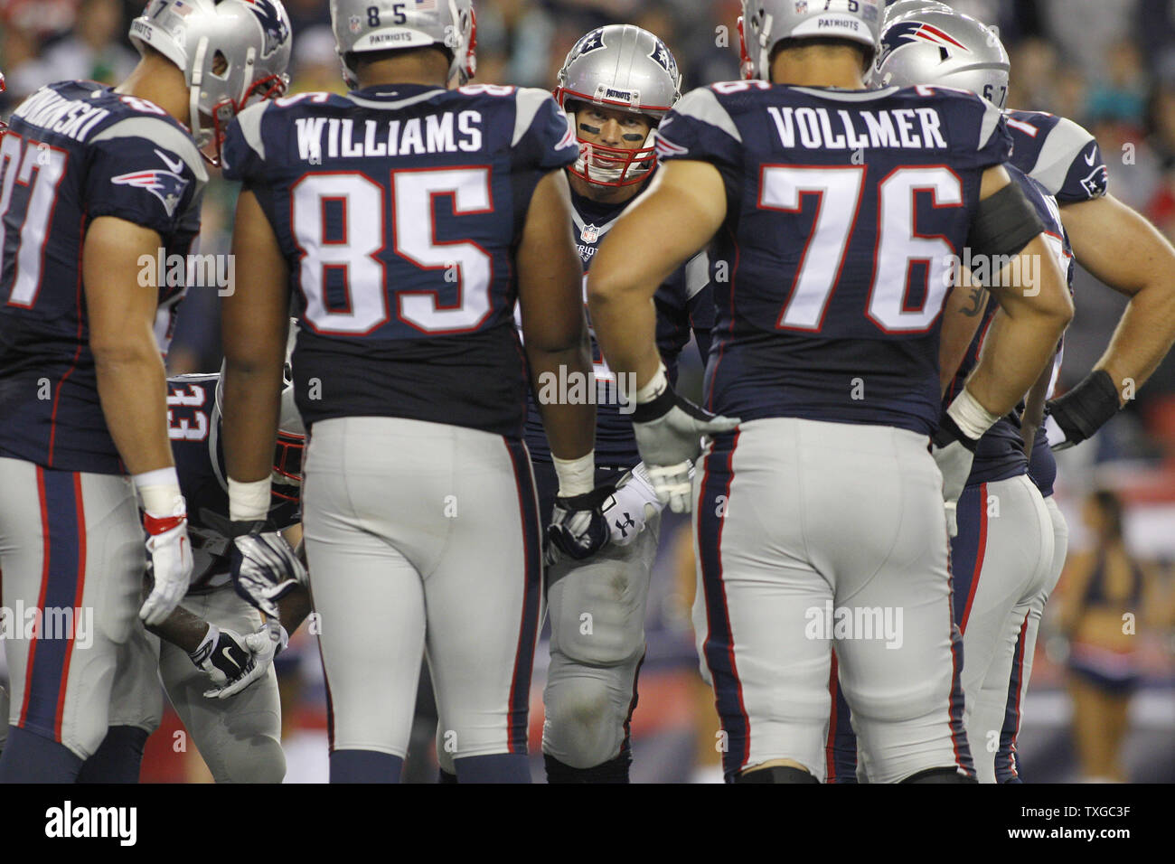 New England Patriots quarterback Tom Brady (12) calls a play in the ...