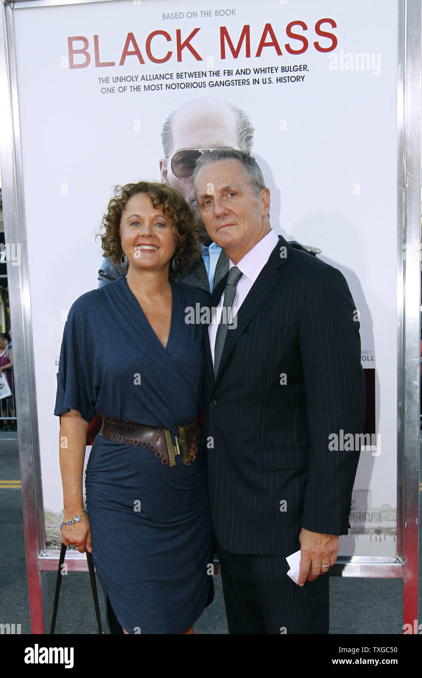 Actor David DeBeck (R) poses for a photo with a guest on the red carpet ...