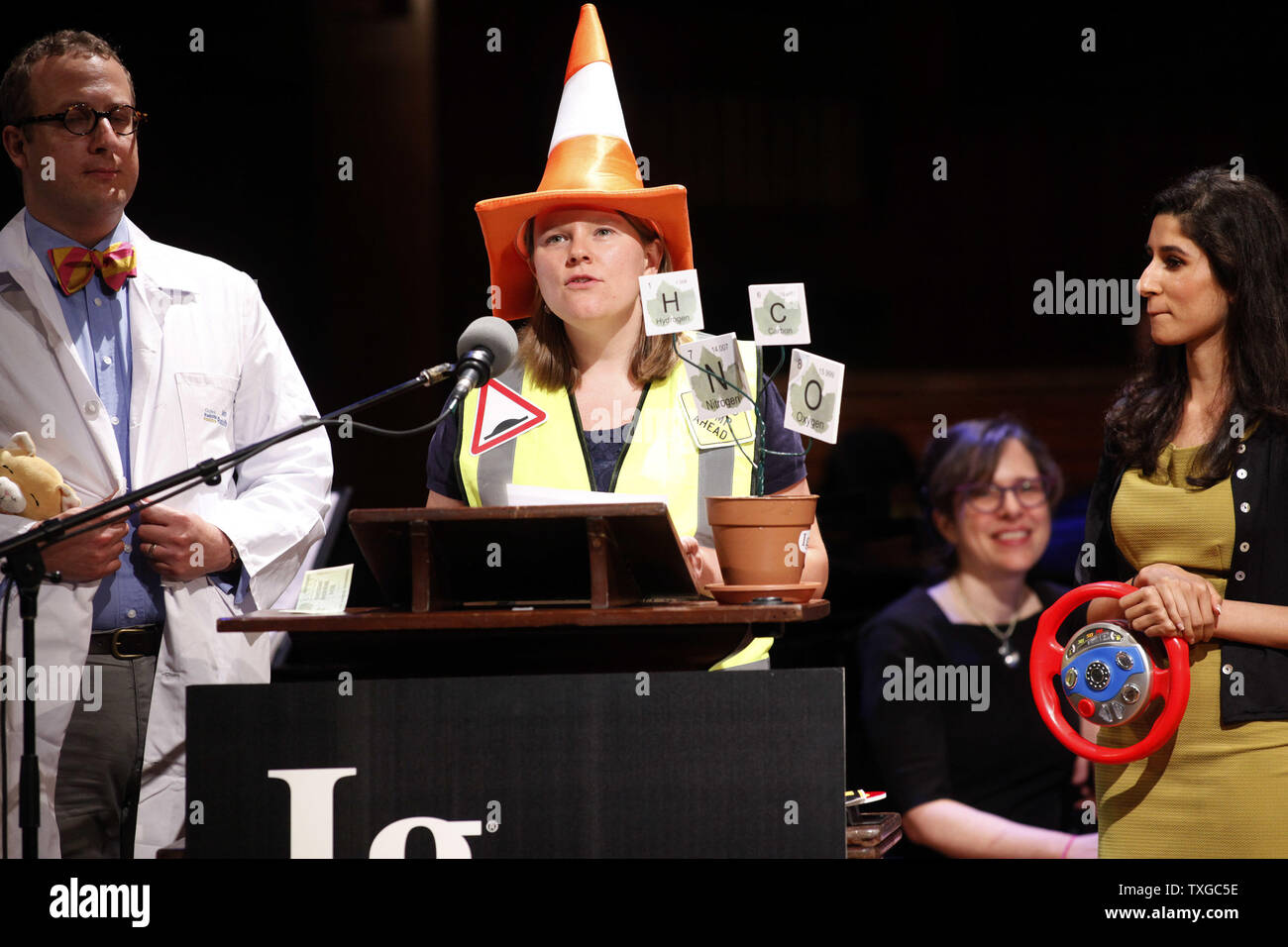 Helen F. Ashdown (C) of University of Oxford accepts her team's 2015 Ig ...