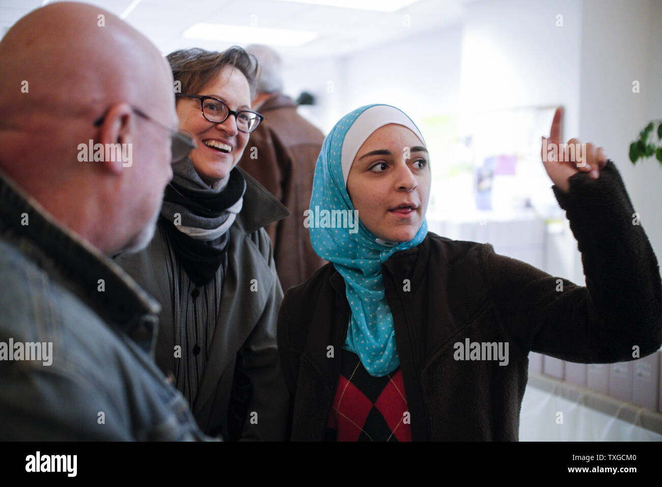 Jena Khreim (R) greets Ann Feldman (C) and Rich Feldman during 'Meet-a ...