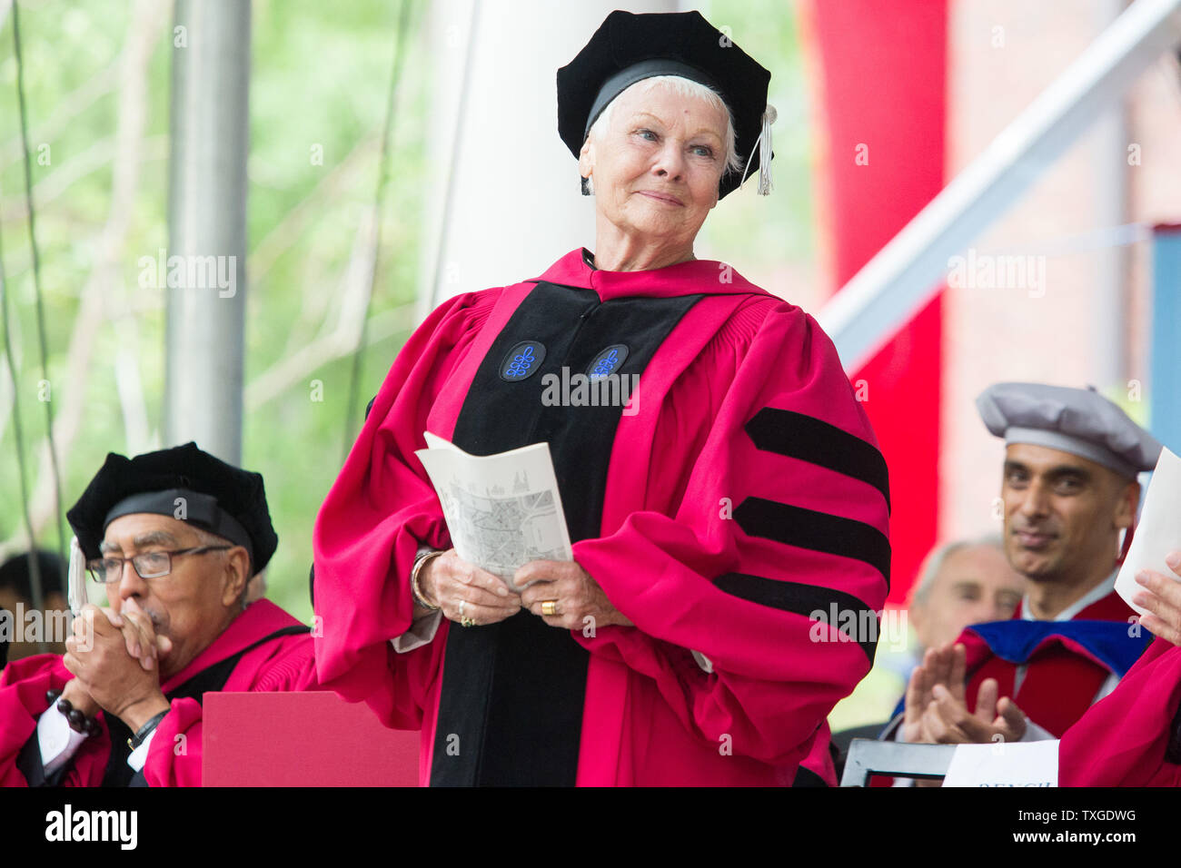 Actress Dame Judy Dench stands as she is introduced for the ...