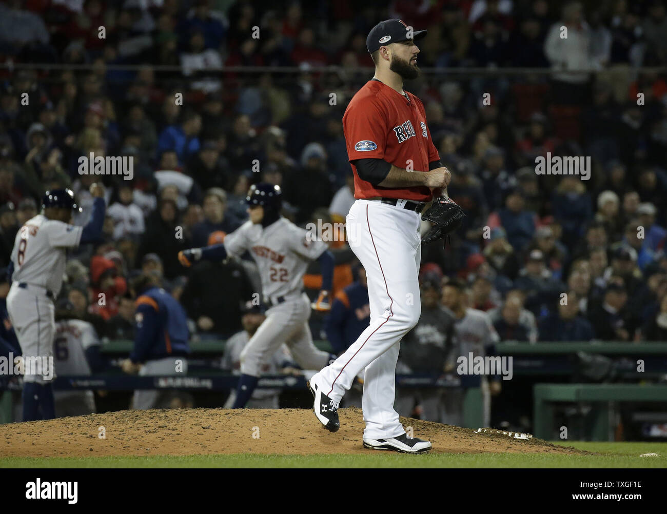 Houston Astros' Josh Reddick (22) hits a solo homer against Boston Red ...