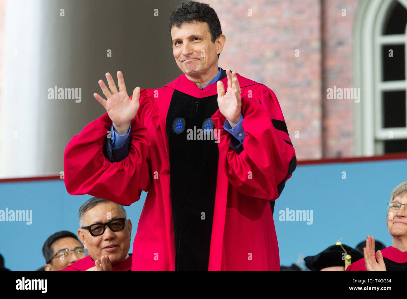 David Remnick, editor of The New Yorker, stands before receiving his ...