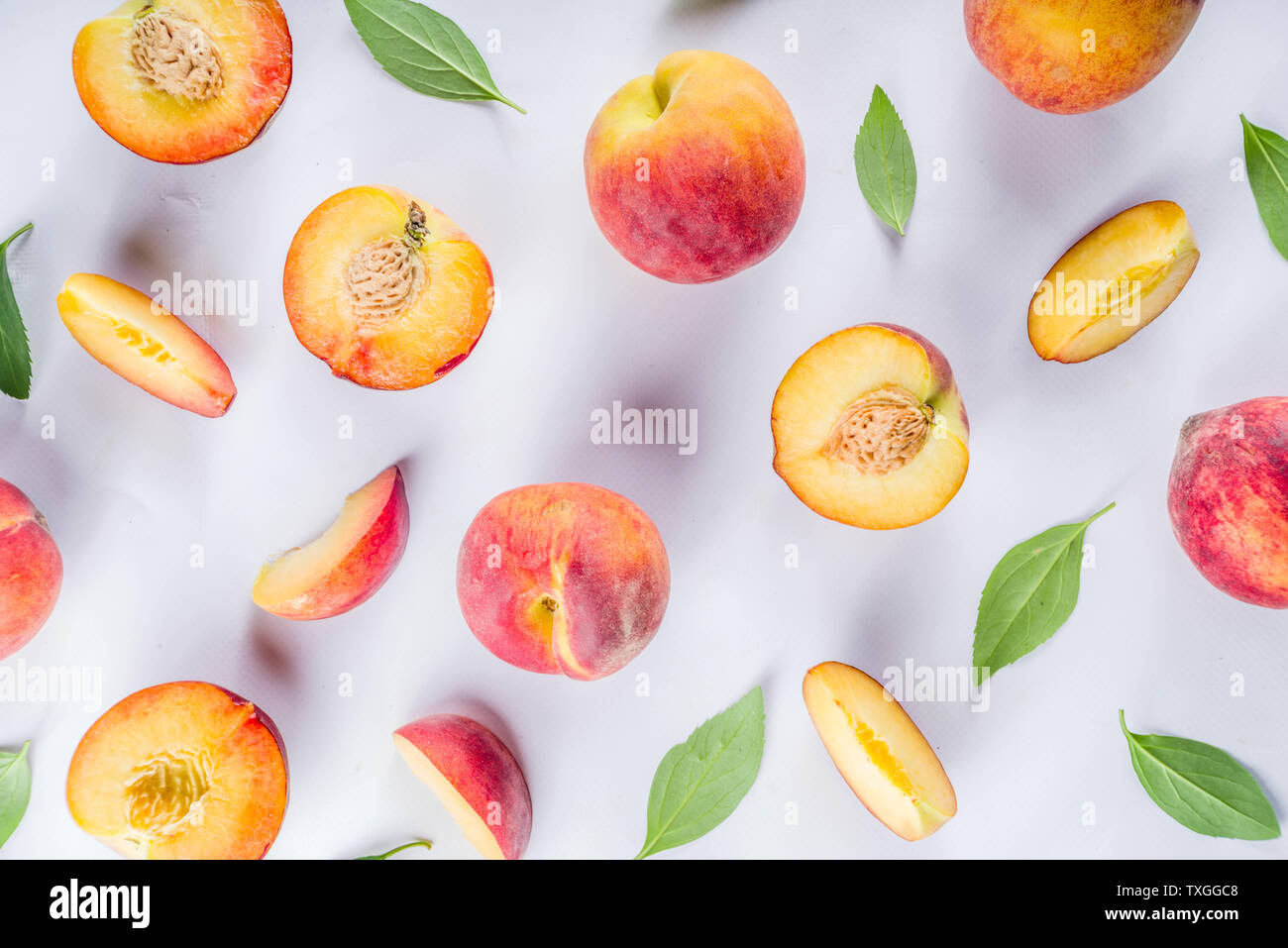 Fresh organic peaches, simple pattern, layout on white background Stock ...