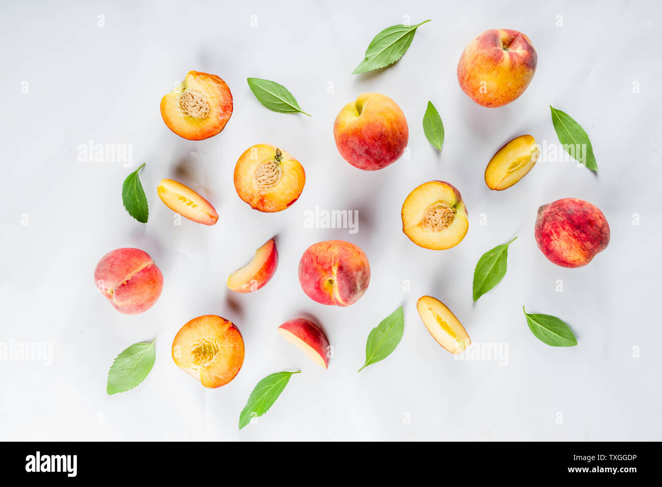 Fresh organic peaches, simple pattern, layout on white background Stock ...