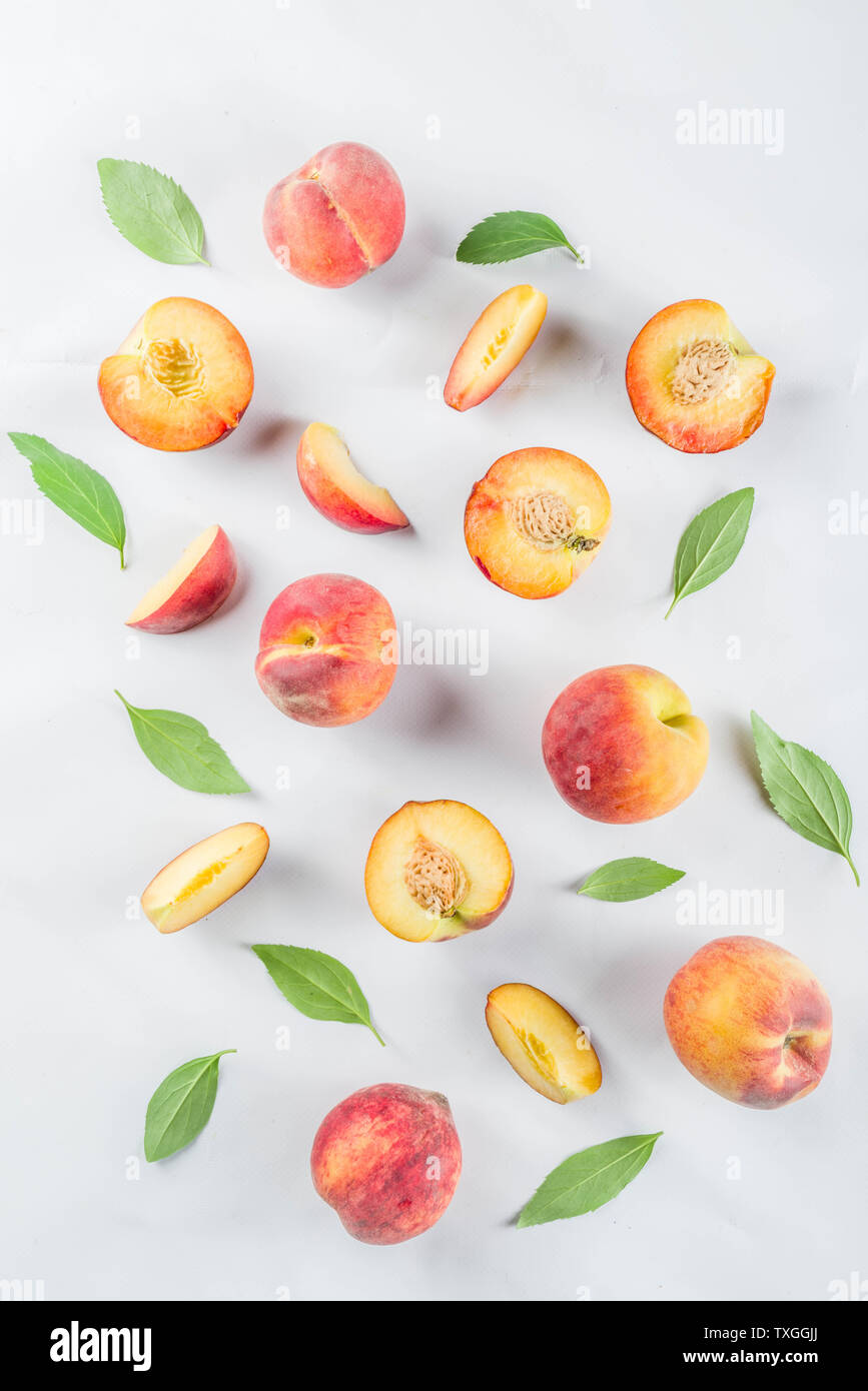 Fresh organic peaches, simple pattern, layout on white background Stock ...