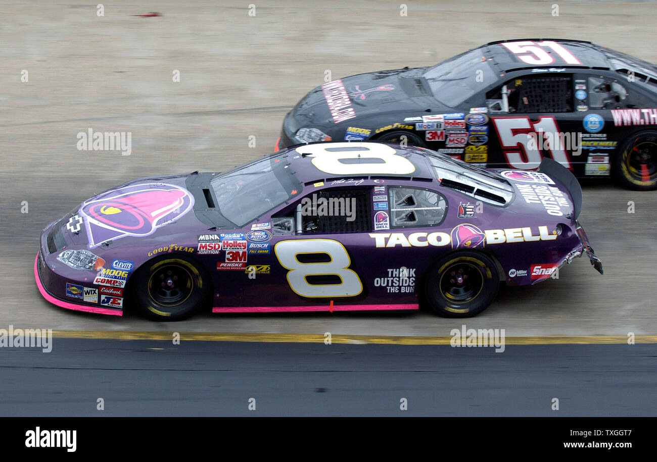 Martin Truex Jr. (8) passes Stan Boyd (51) on his way to win the ...