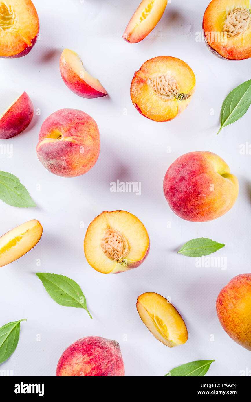 Fresh organic peaches, simple pattern, layout on white background Stock ...