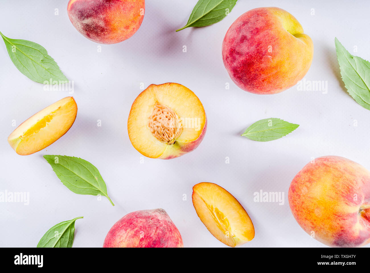 Fresh organic peaches, simple pattern, layout on white background Stock ...