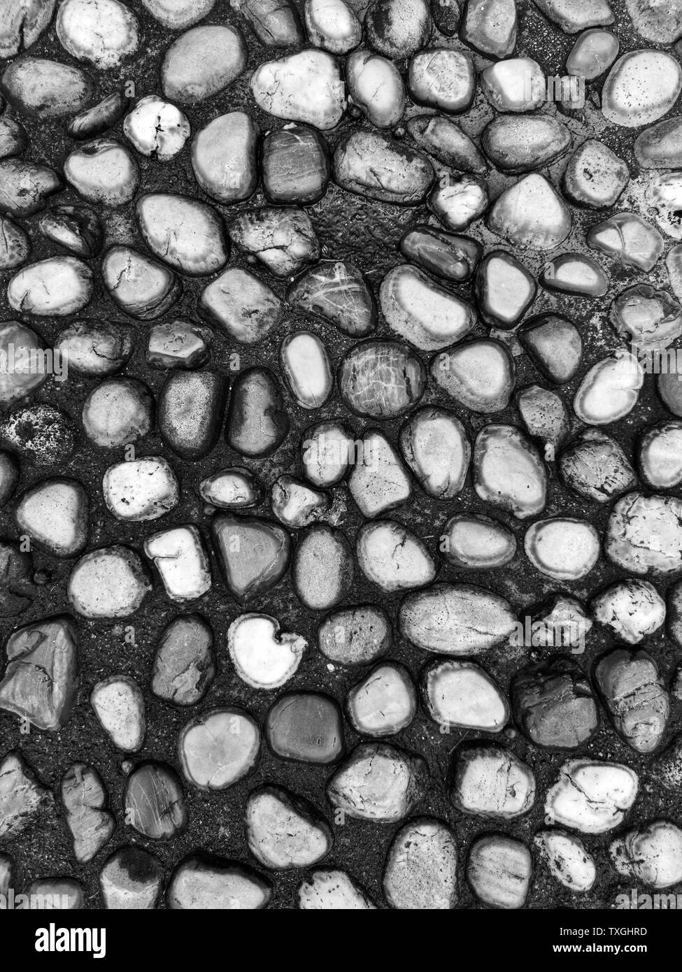 Black-and-white cobblestone background material Stock Photo - Alamy