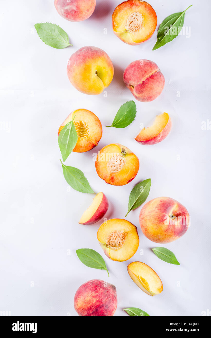 Fresh organic peaches, simple pattern, layout on white background Stock ...