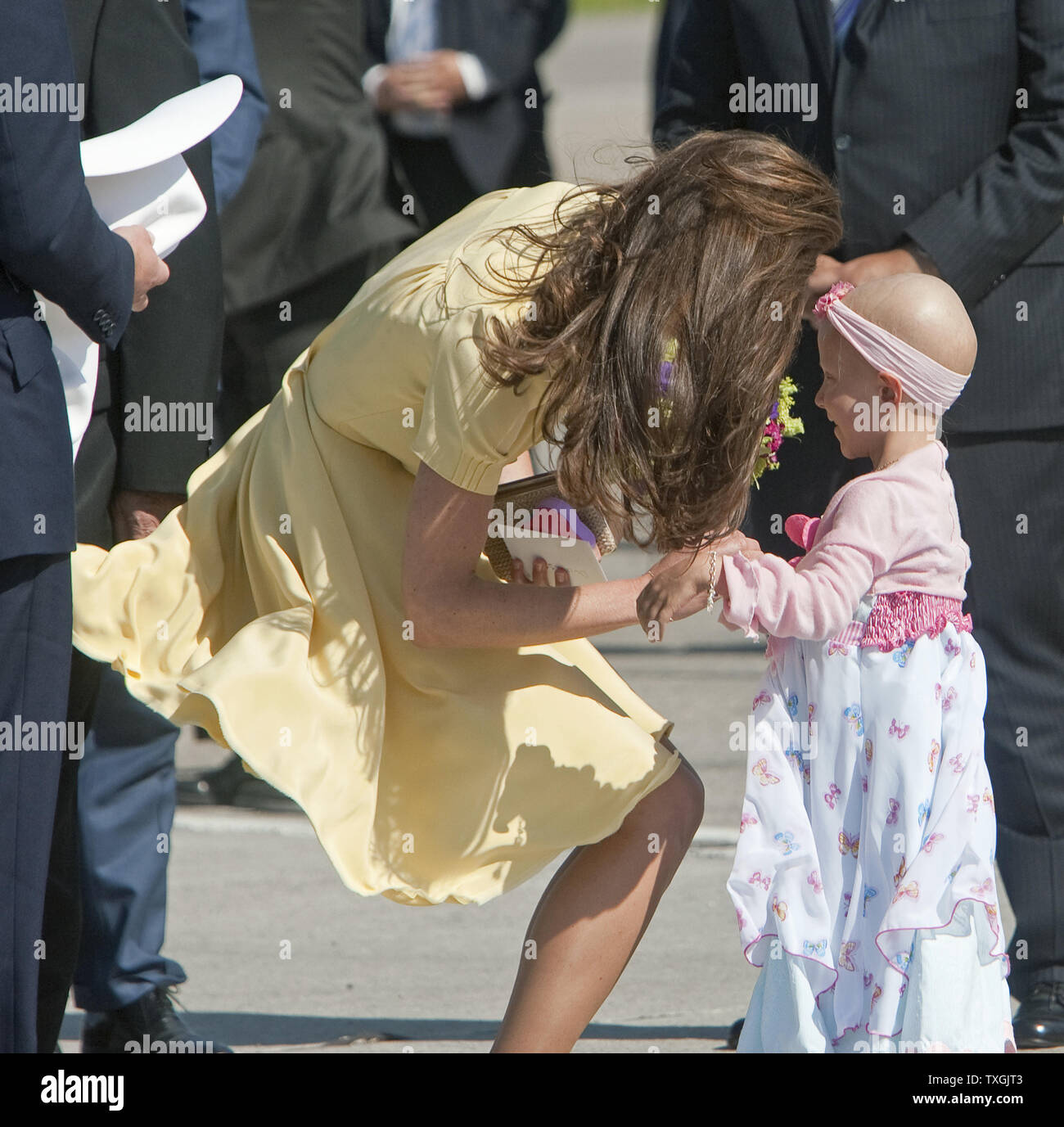 On the final leg of their royal tour, Prince William watches his wife ...