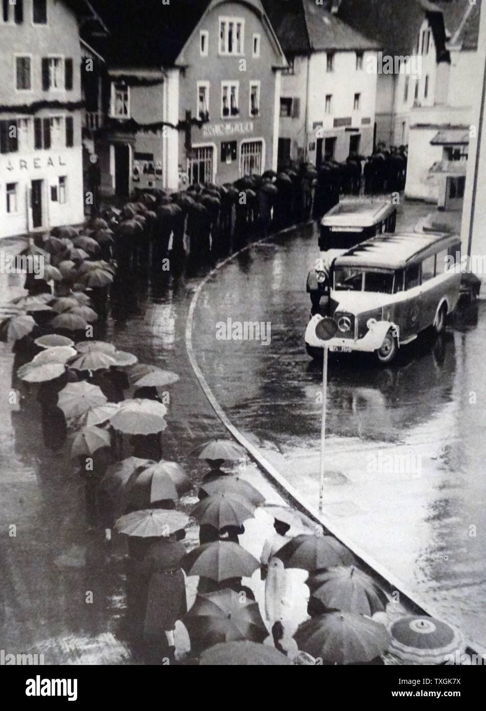 Photographic print depicting Liechtensteiners queued for Church on a ...