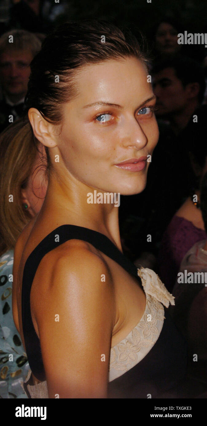 Model and actress Rie Rasmussen poses for photographers on the red ...