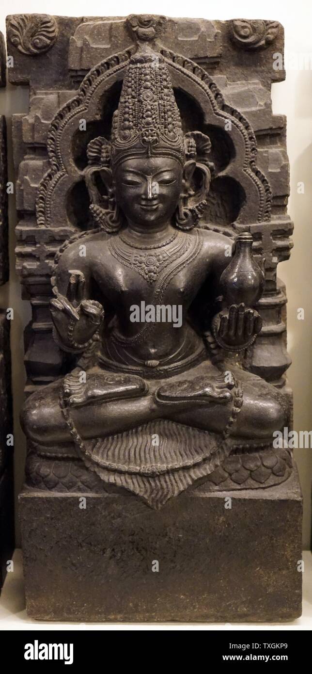 Sculpture of the Indian planet of the Mars (Mangala) holding a water ...