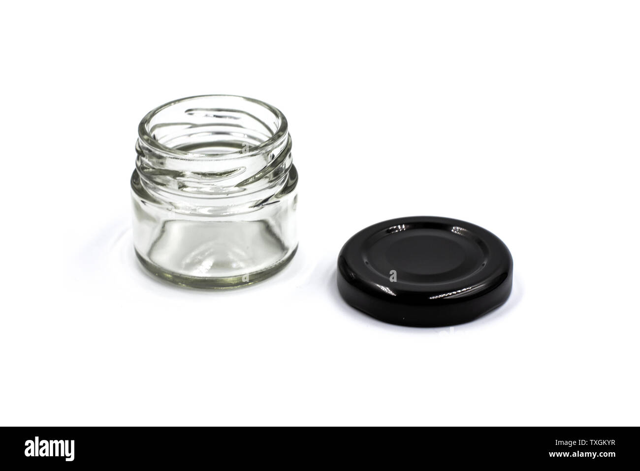 Empty glass jar isolated on white background Stock Photo - Alamy