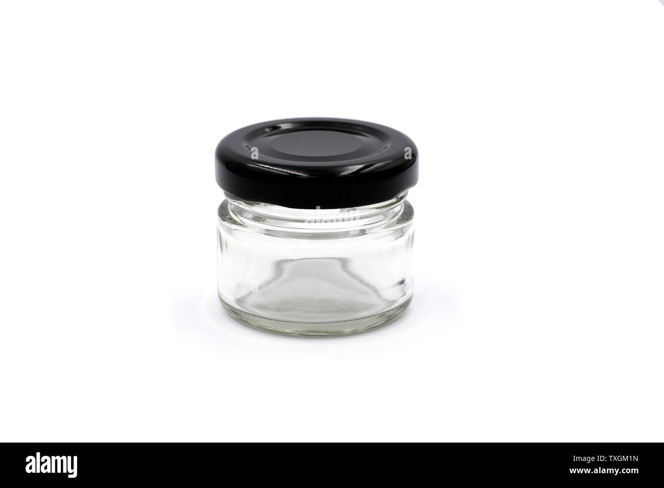 Empty glass jar isolated on white background Stock Photo - Alamy
