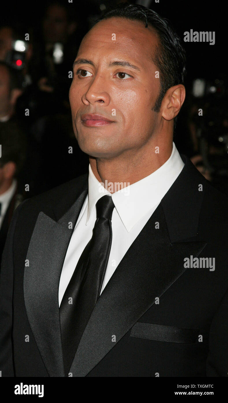 Actor Dwayne "The Rock" Johnson arrives on the red carpet before a ...