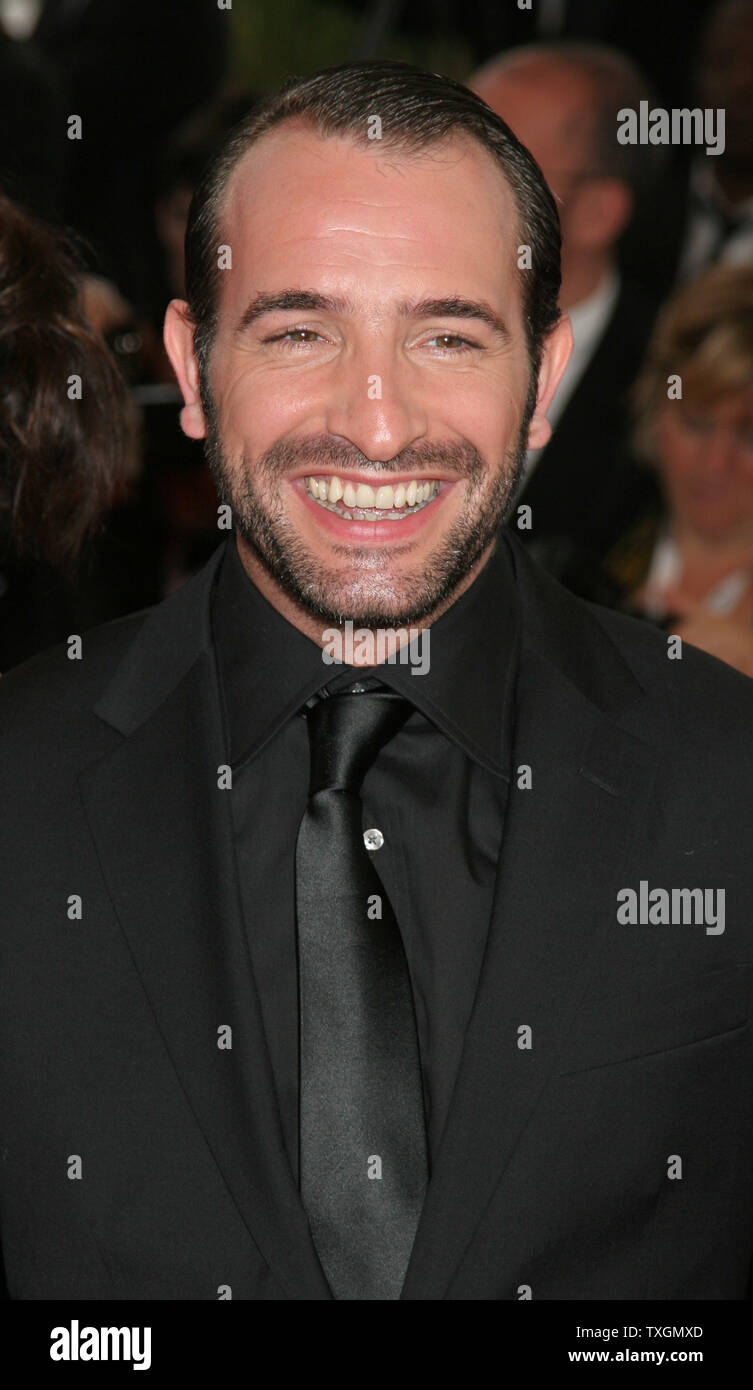 French actor Jean Dujardin arrives on the red carpet for a screening of ...