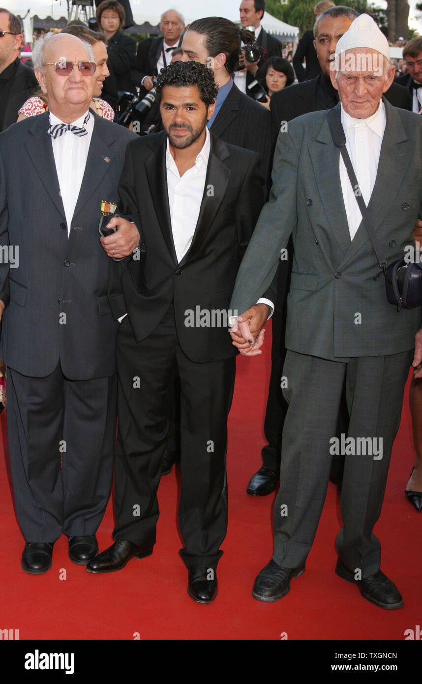 French actor Jamel Debbouze (C) arrives on the red carpet with two ...