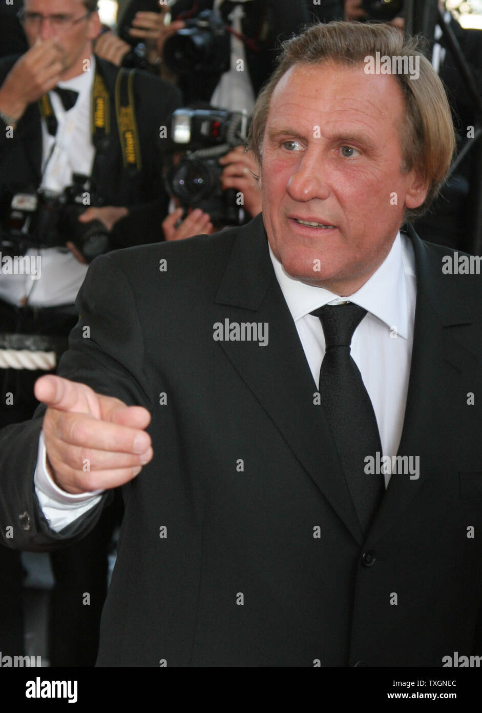 French actor Gerard Depardieu arrives on the red carpet before a ...