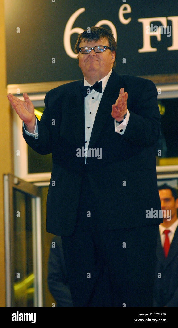 Director Michael Moore arrives at the Palais des Festivals for the gala ...