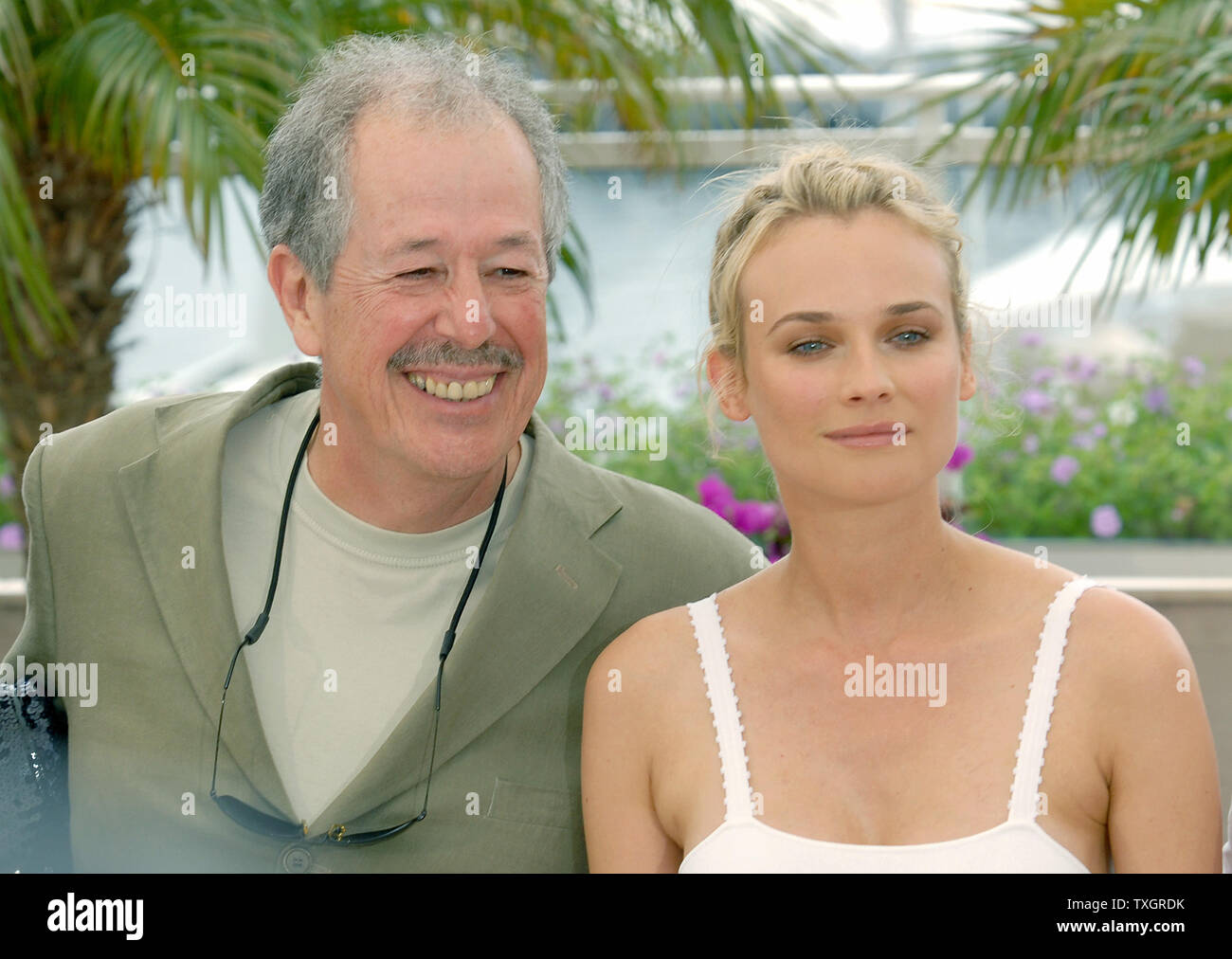Director Denys Arcand (L) and Diane Kruger attend the photocall for "L ...