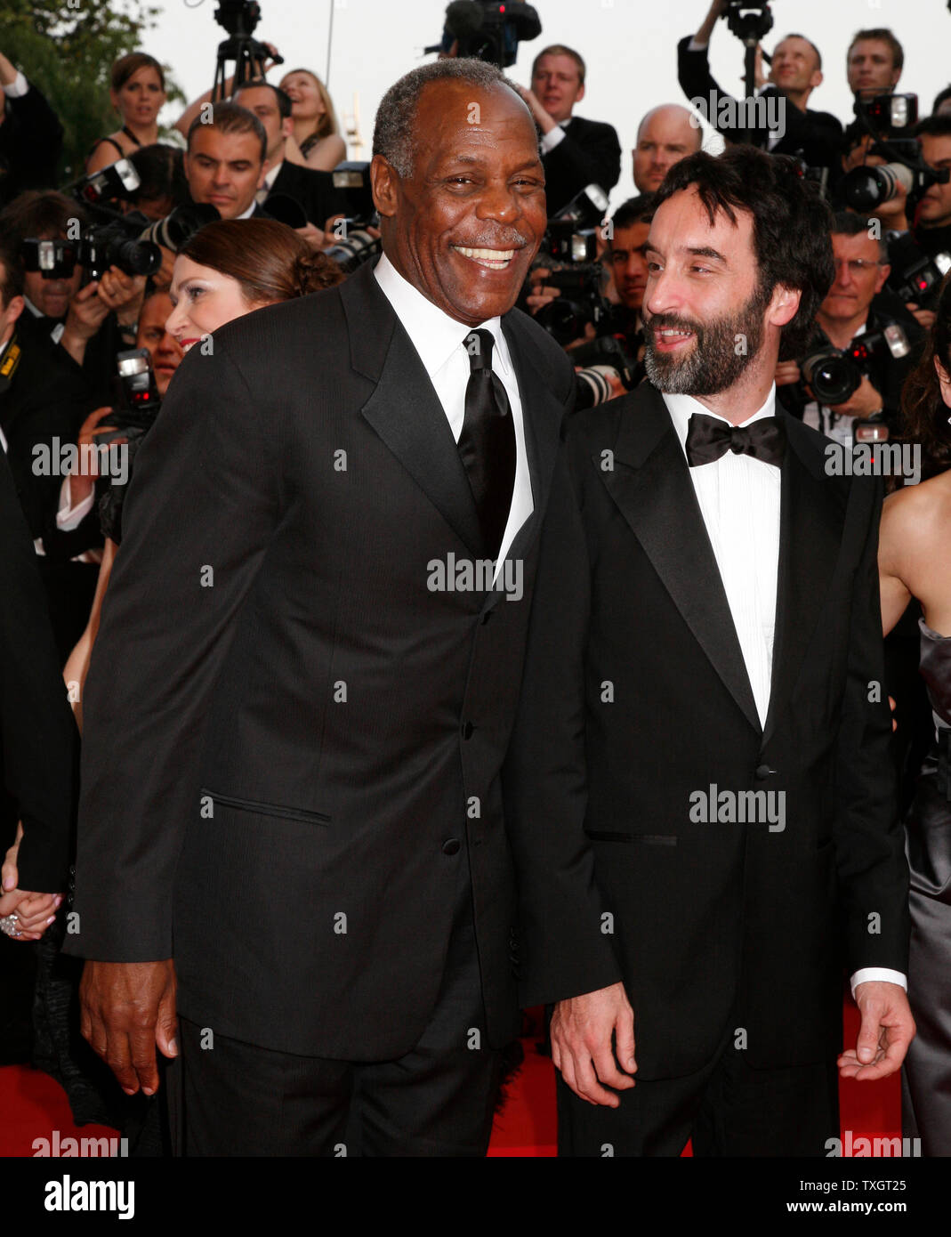 Actor Danny Glover and screenwriter Don McKellar arrive on the red ...
