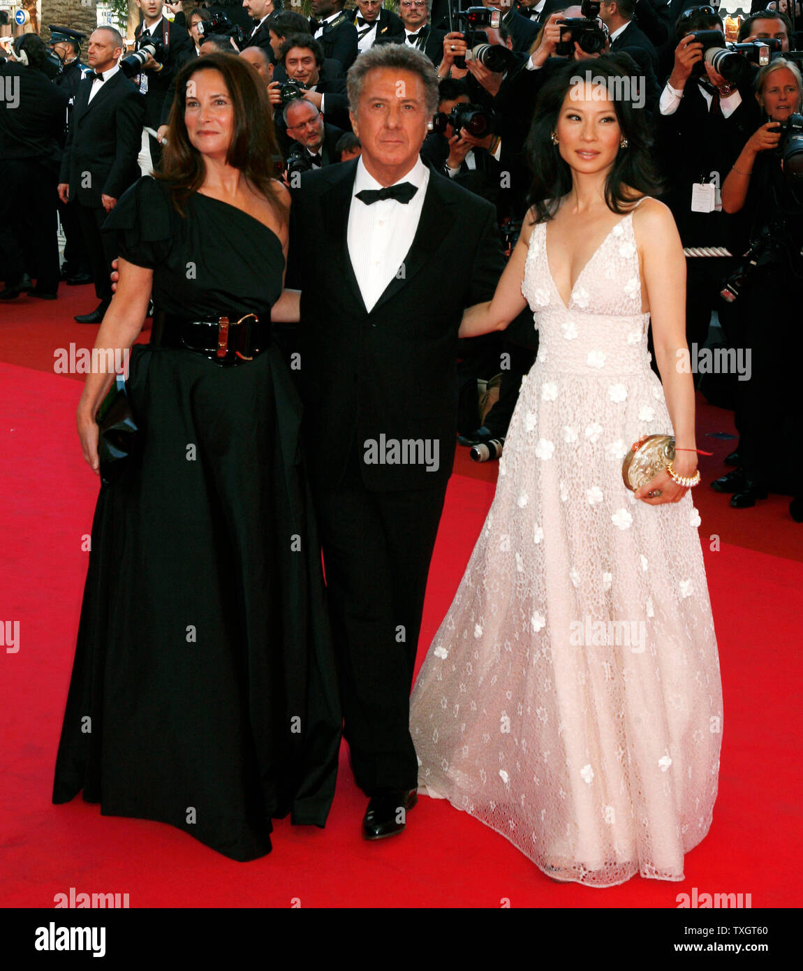 Actress Lucy Liu (R), actor Dustin Hoffman (C) and wife Lisa Hoffman ...