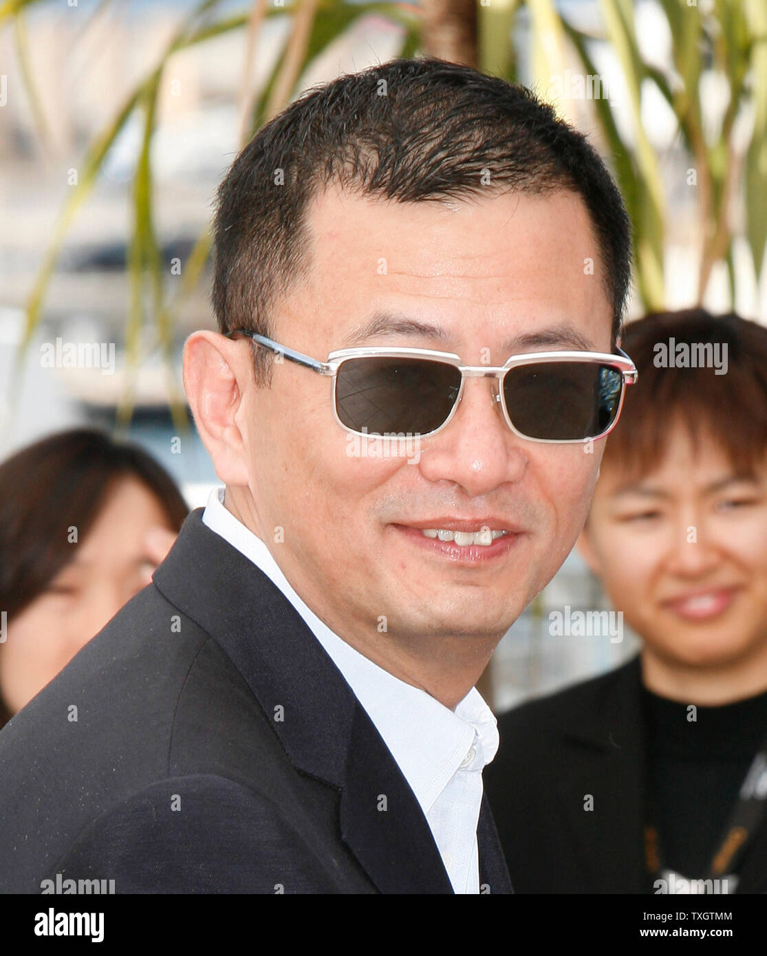 Director Wong Kar Wai arrives at a photocall for the film "Ashes of ...