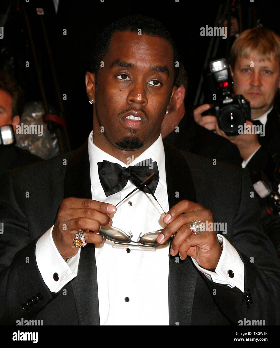 Rapper Sean Diddy Combs arrives on the red carpet before a screening of ...