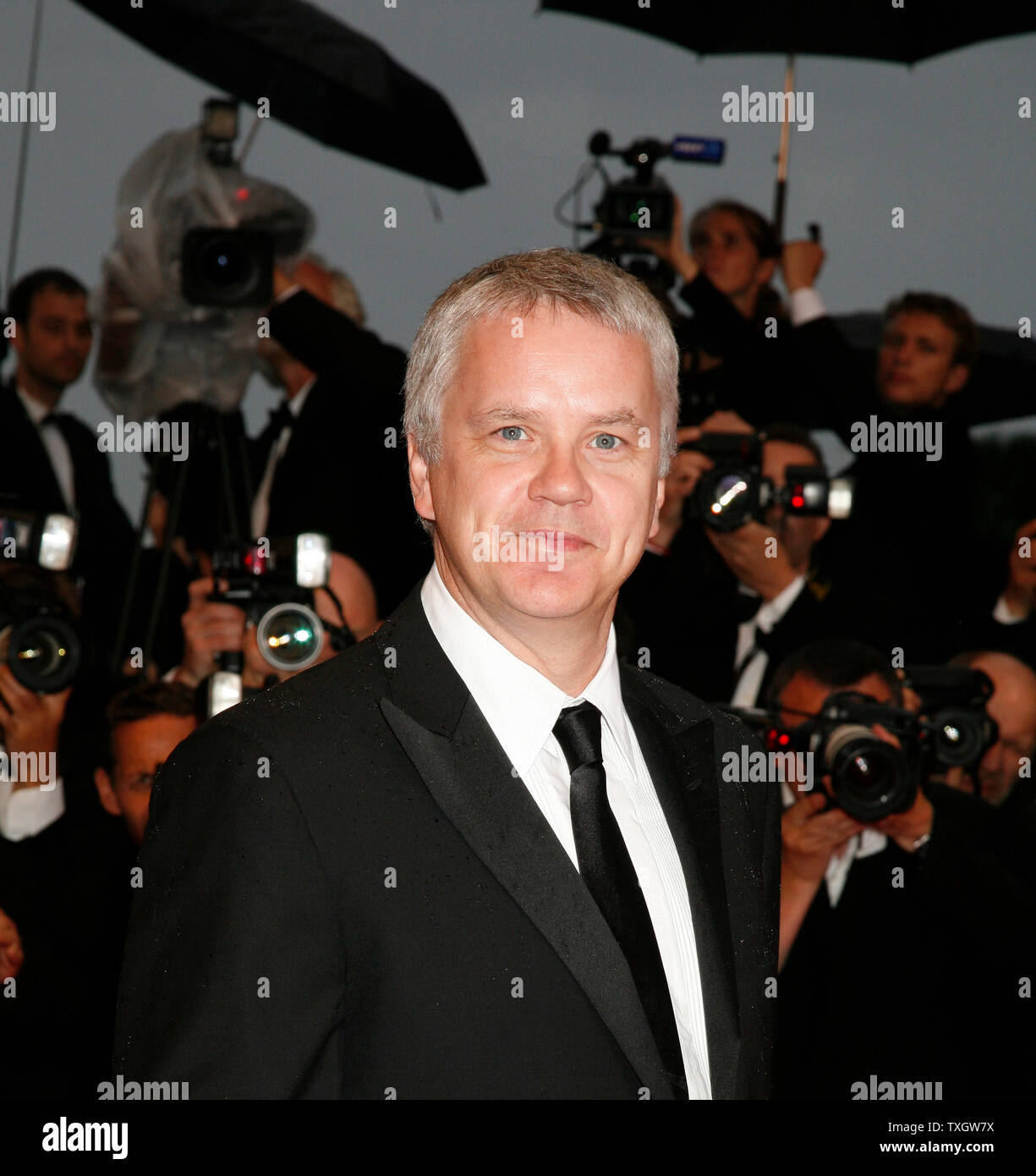 Actor Tim Robbins arrives on the red carpet before a screening of the ...