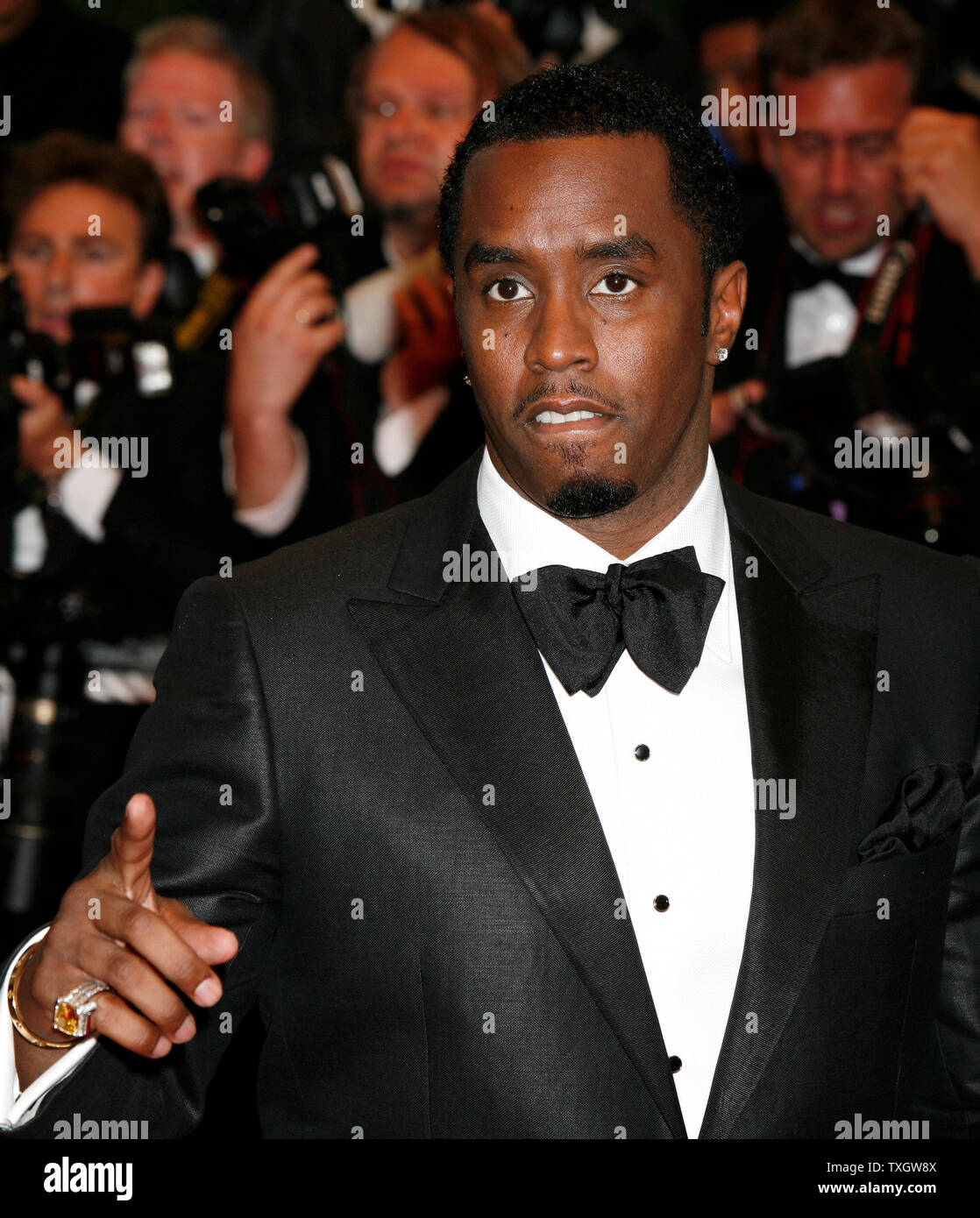 Rapper Sean Diddy Combs arrives on the red carpet before a screening of ...