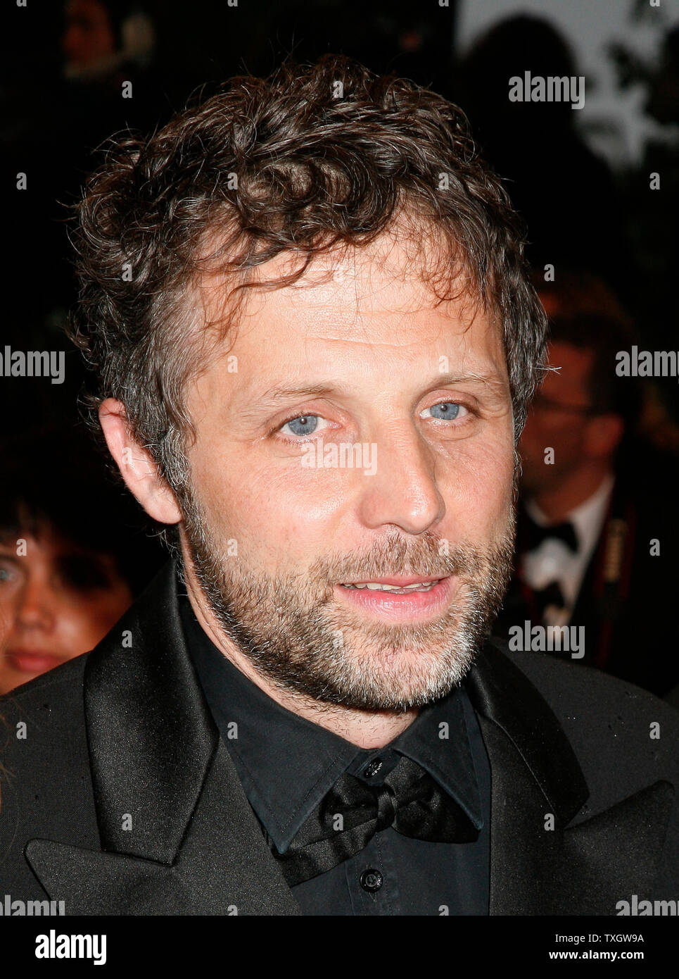 Comedian Stephane Guillon arrives on the red carpet before a screening ...