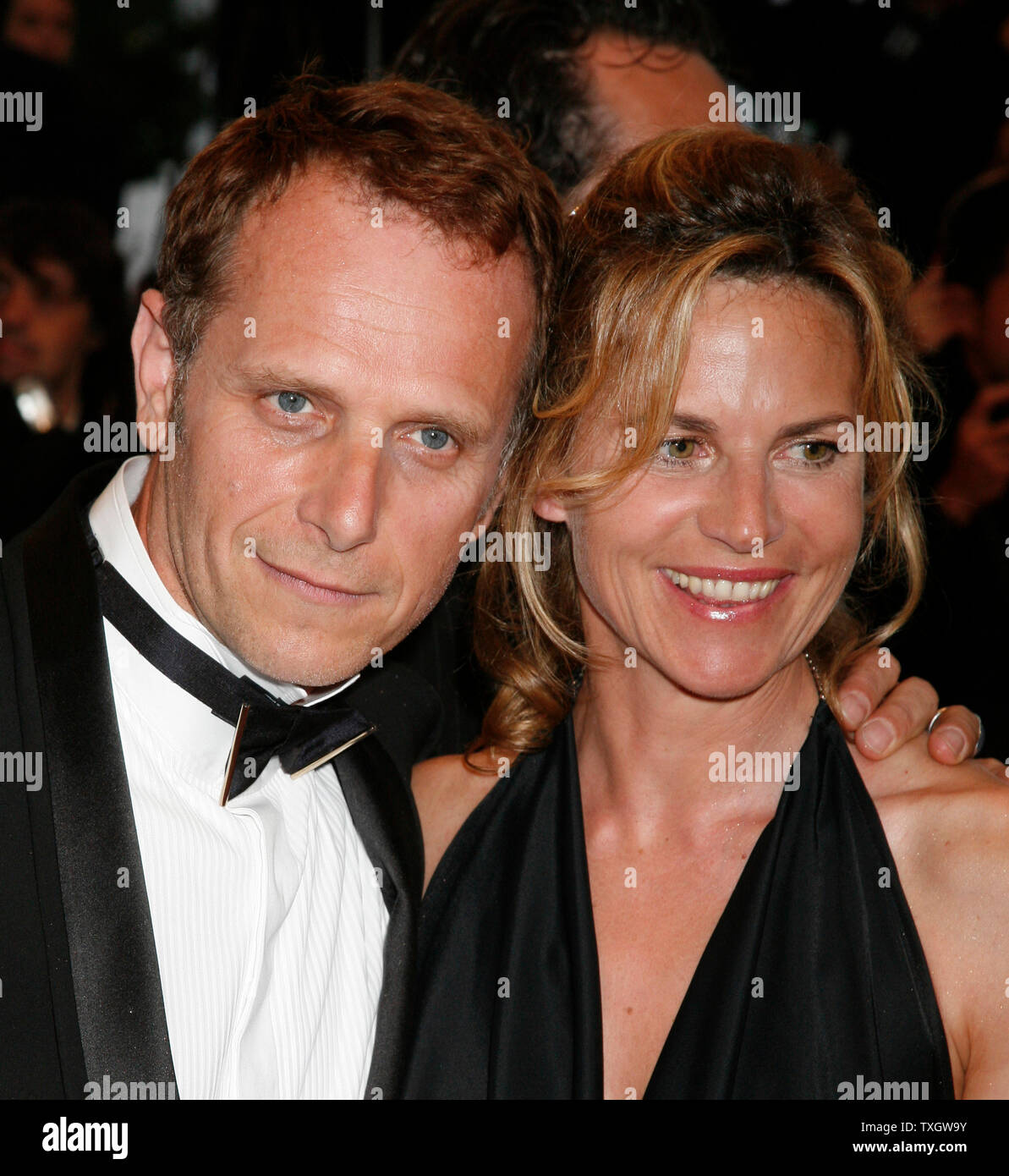 Actor Charles Berling and guest arrive on the red carpet before a ...